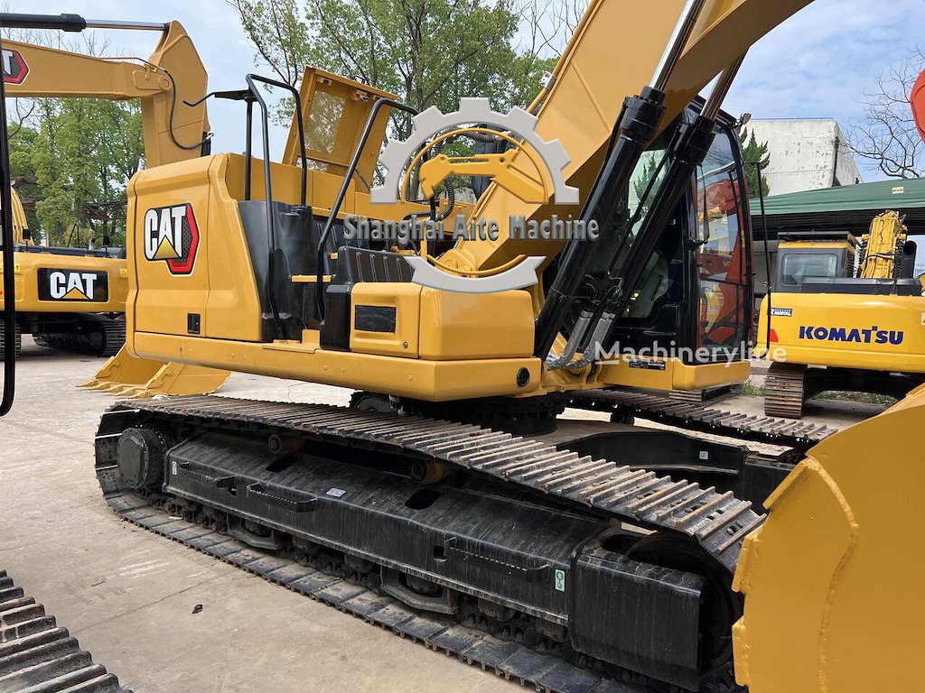 Caterpillar 323 bager guseničar