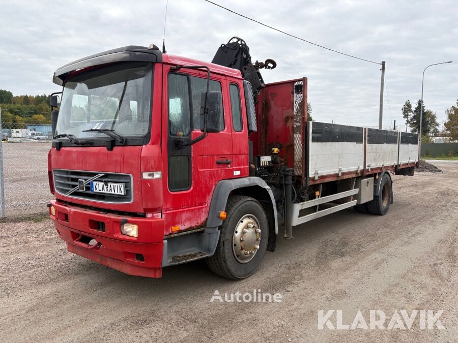 Prodaje se Volvo FL 618 kamion s ravnom platformom na aukciji