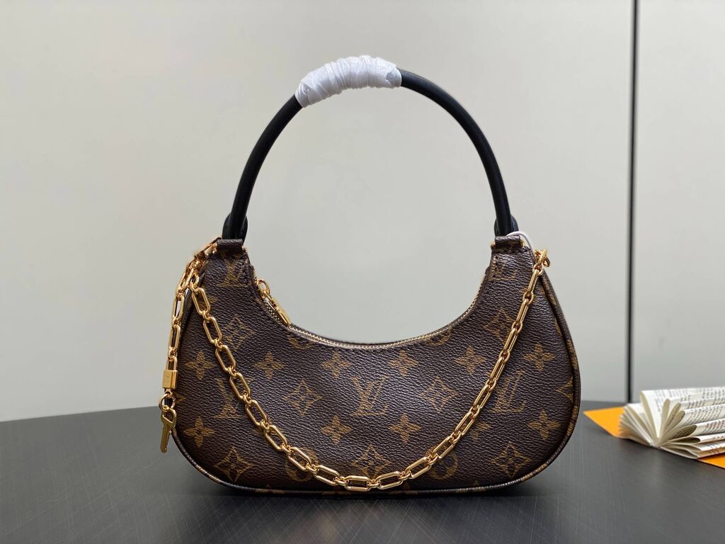 Elegantna torbica, Louis Vuitton, Materijal: Platno