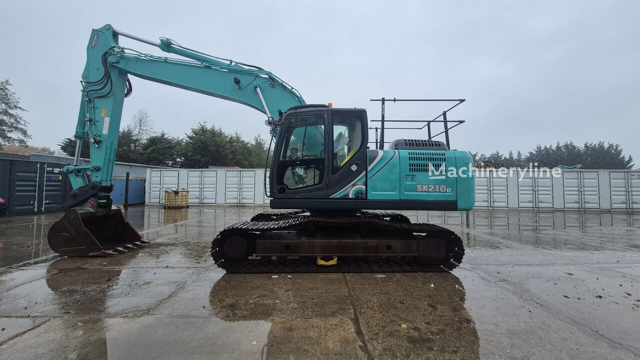 Kobelco SK210 bager guseničar