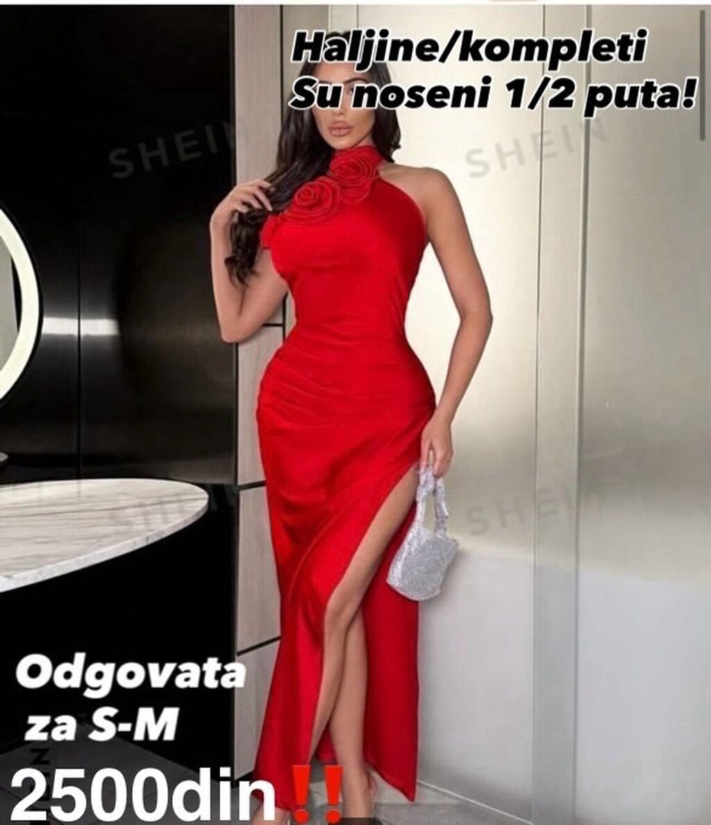 Elegantna crvena duga haljina sa visokim prorezom sa strane. Model sa