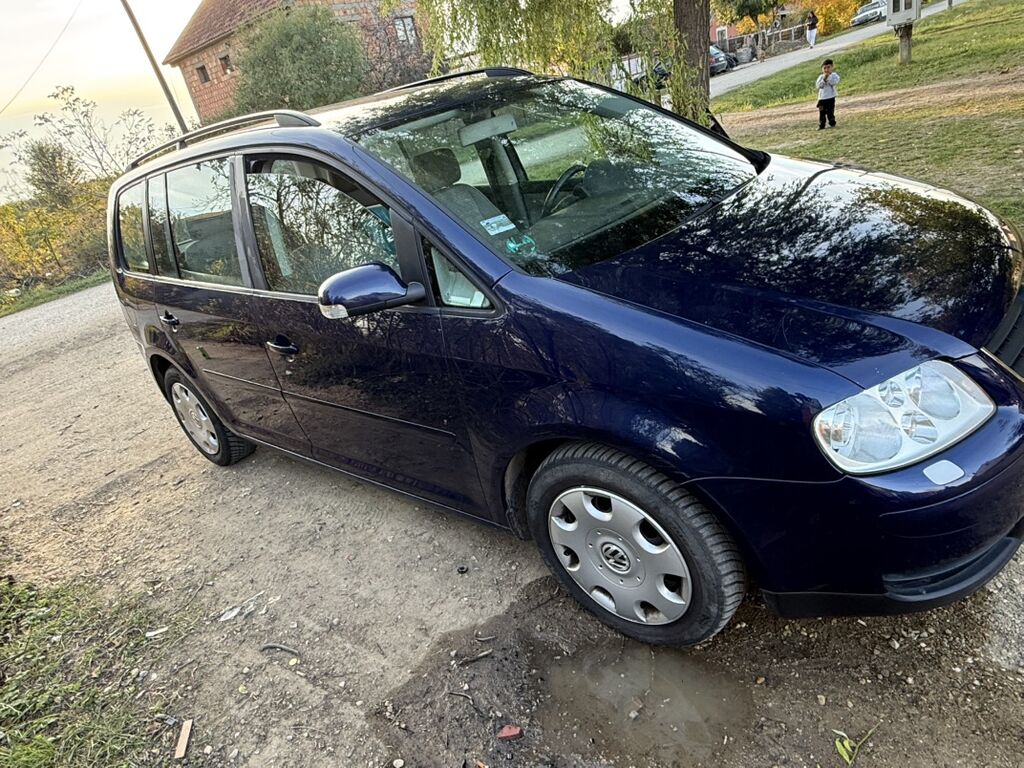 Volkswagen Touran: 2 l | 2005 г. MPV Body Type