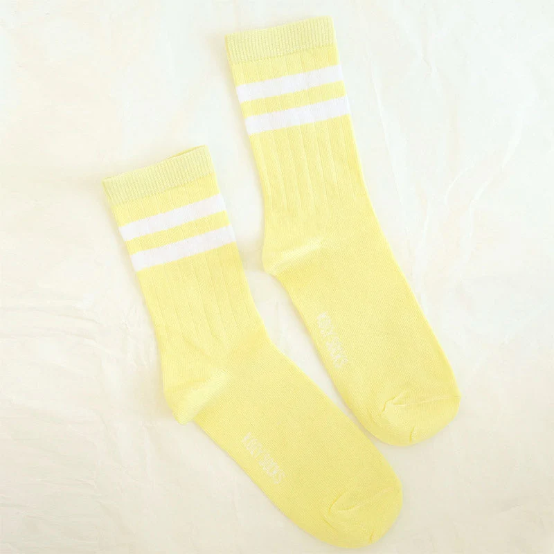Yellow socks with two stripes