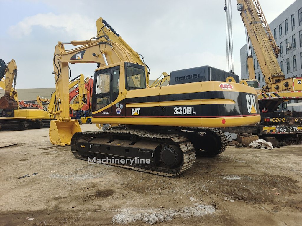 Caterpillar 330BL bager guseničar