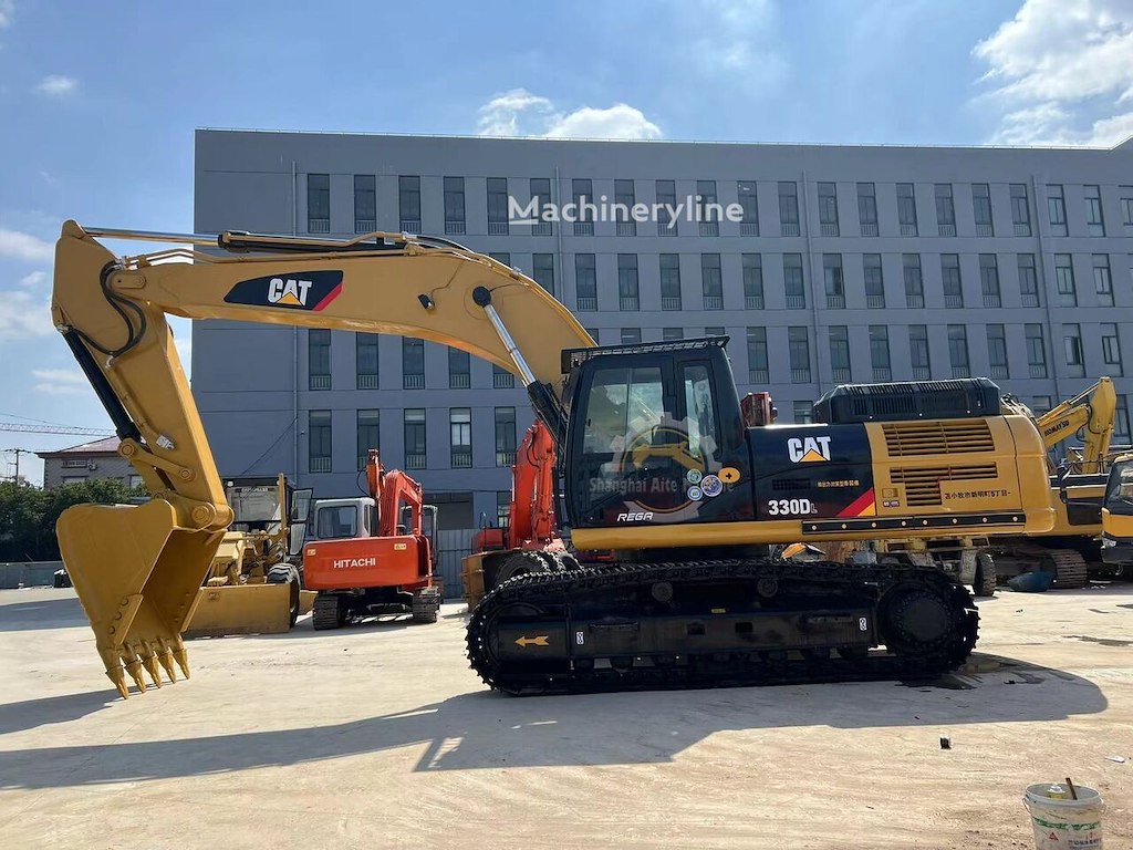 Caterpillar 330DL bager guseničar