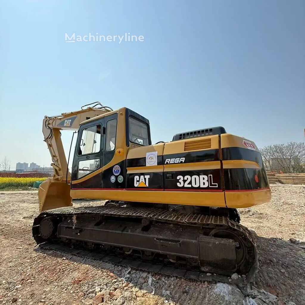 Caterpillar 320bl bager guseničar