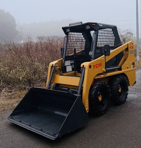 TCM SKID LOADER mini utovarivač