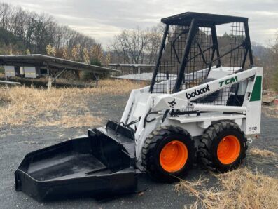 TCM SKID LOADER mini utovarivač