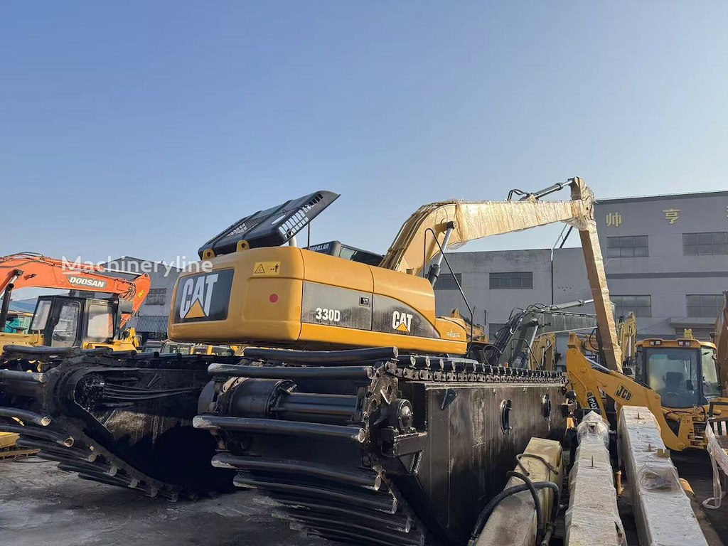 Caterpillar 330D bager amfibija