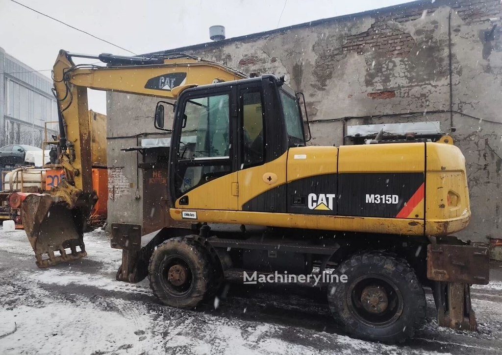 Caterpillar M315D bager točkaš