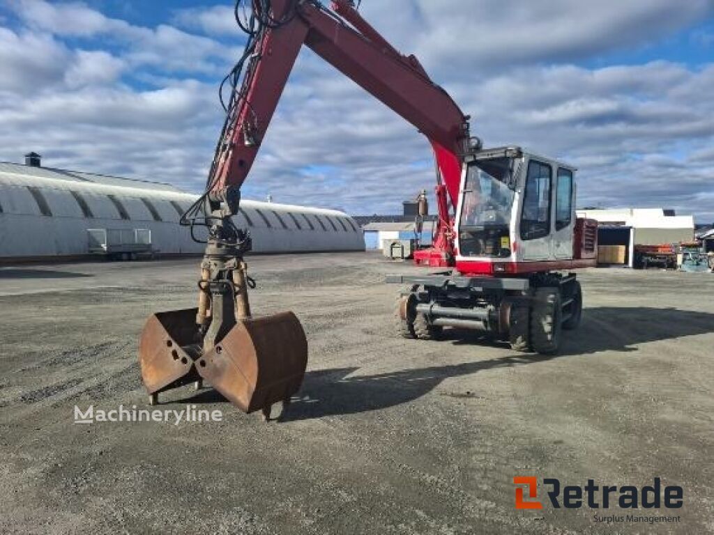 Prodaje se Liebherr A900 ZW bager na šinama na aukciji