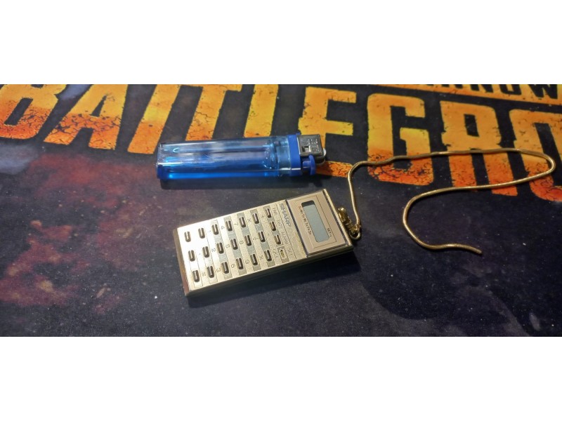 Vintage SHARP gold calculator