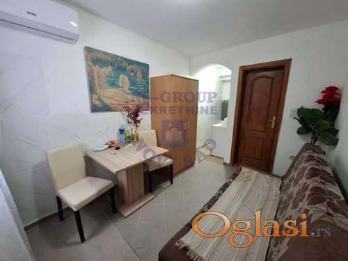 Garsonjera u prizemlju zgrade