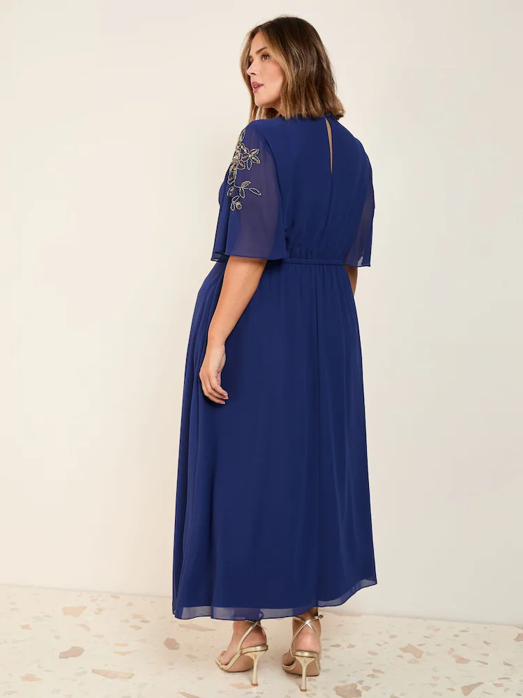 Mornarice - Prijatelji vole ovu midi haljinu ukrašenu kratkim rukavima