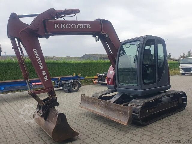 Mini bager
New Holland Kobelco E70 - 8 TON