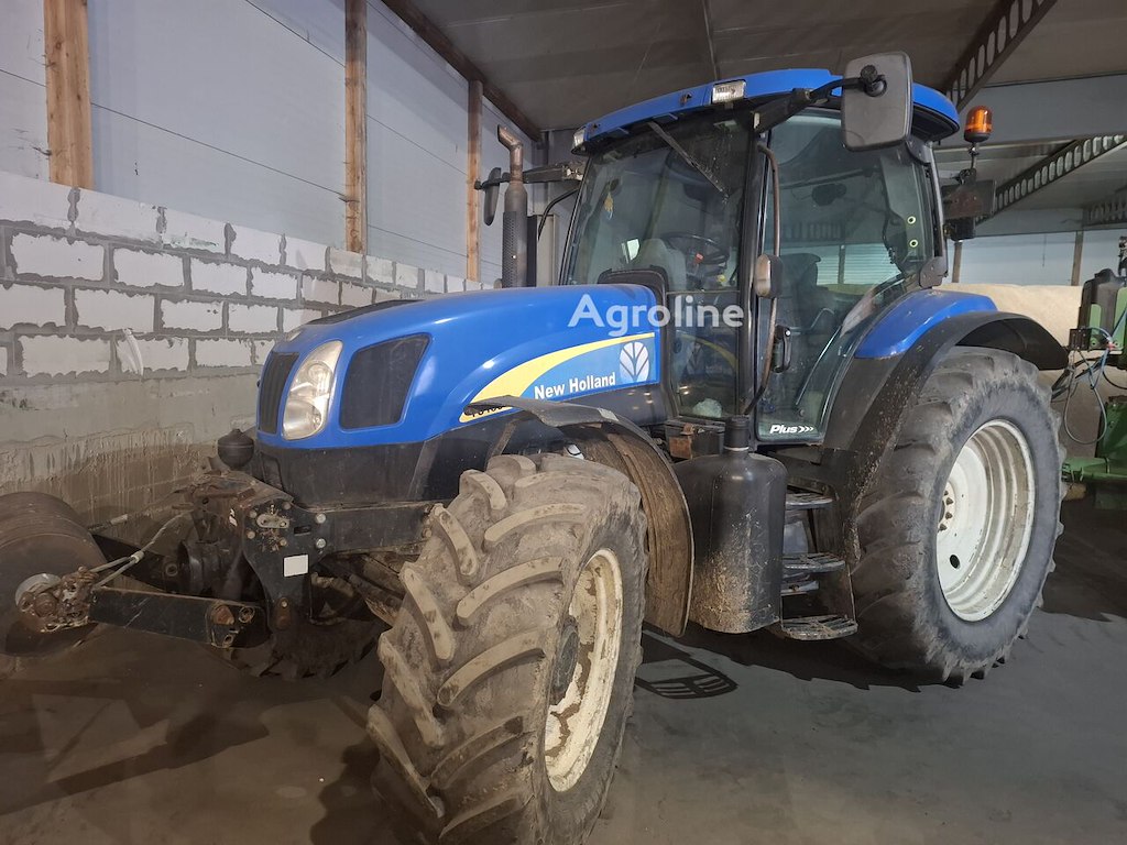 New Holland TS 135a traktor točkaš