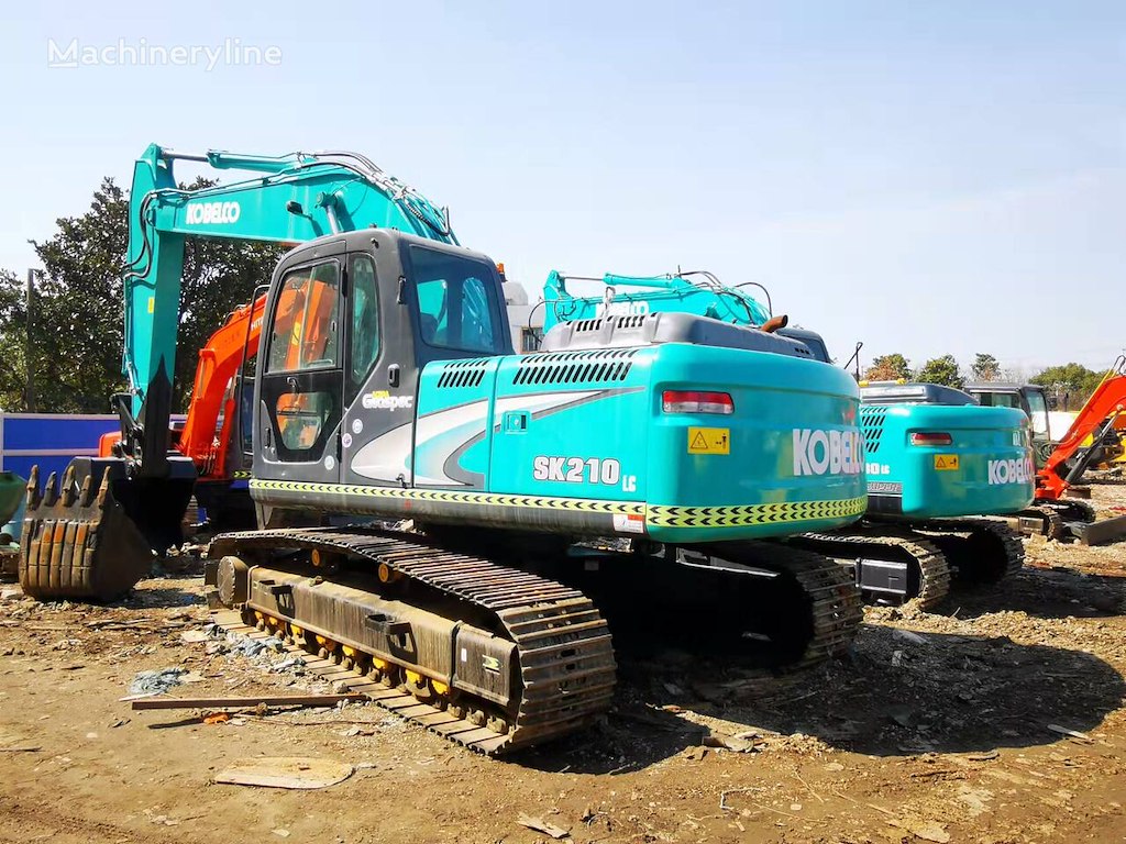 Kobelco SK210 bager guseničar