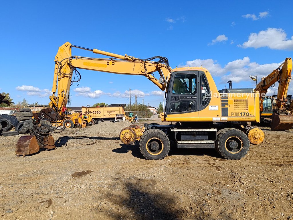 Komatsu PW 170ES bager na šinama