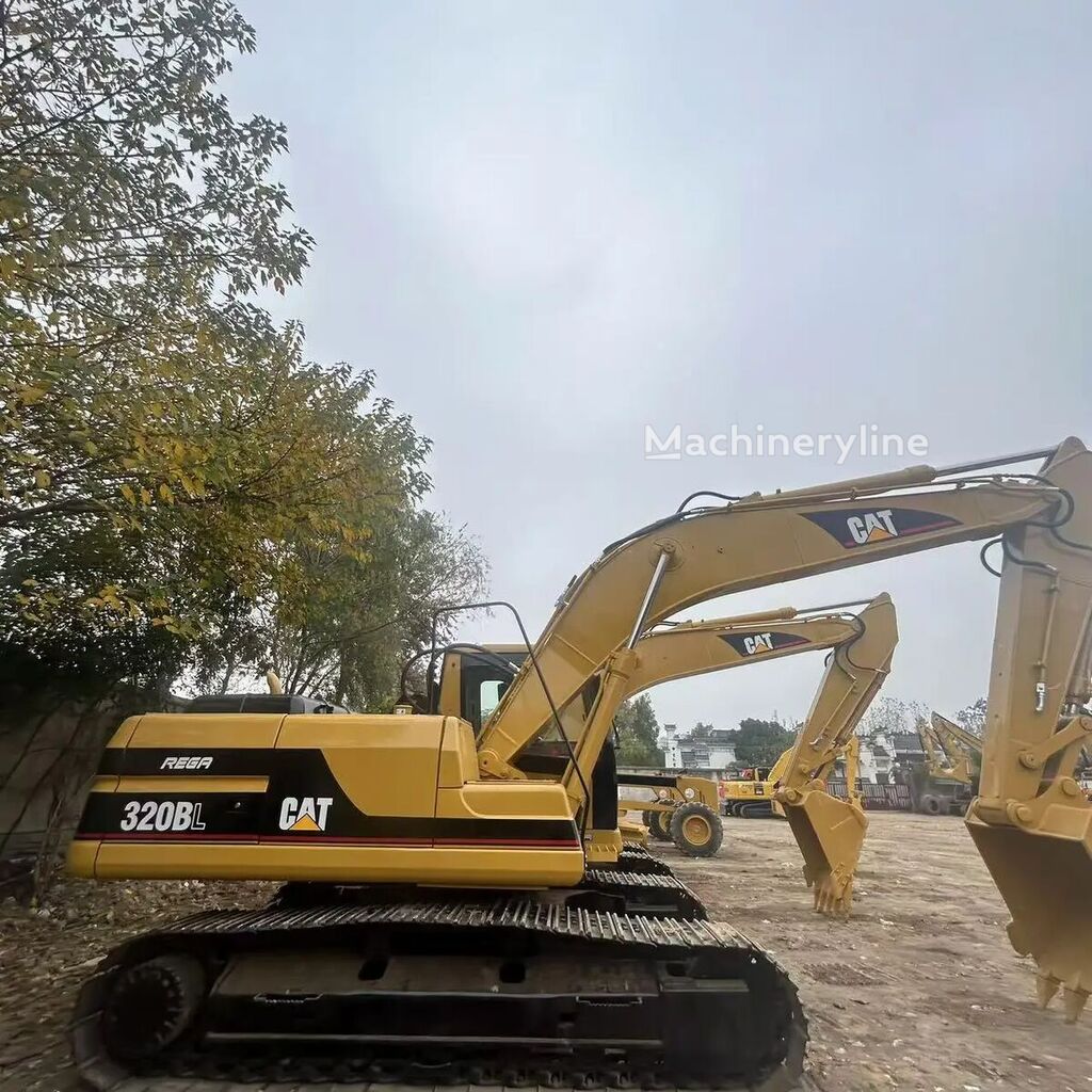 Caterpillar 320b bager guseničar