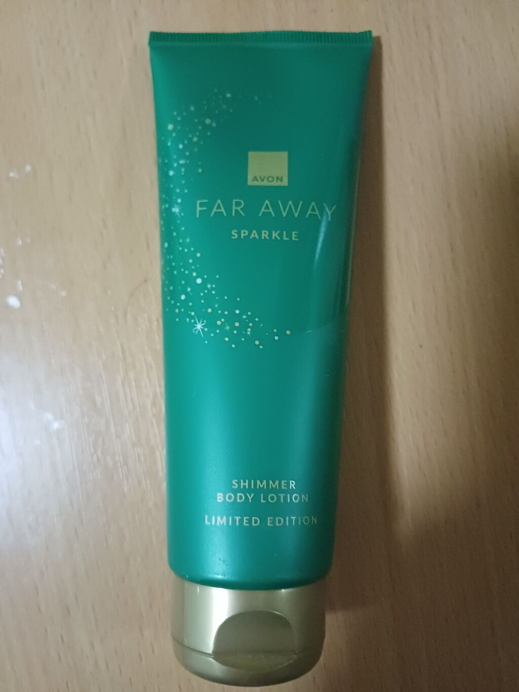 AVON Far Away Sparkle – Shimmer body lotion (limited edition) - Tip