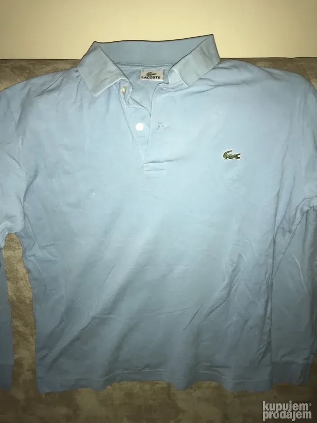 Original Lacoste duks M /L 100% cotton Svetloplava boja Ramena