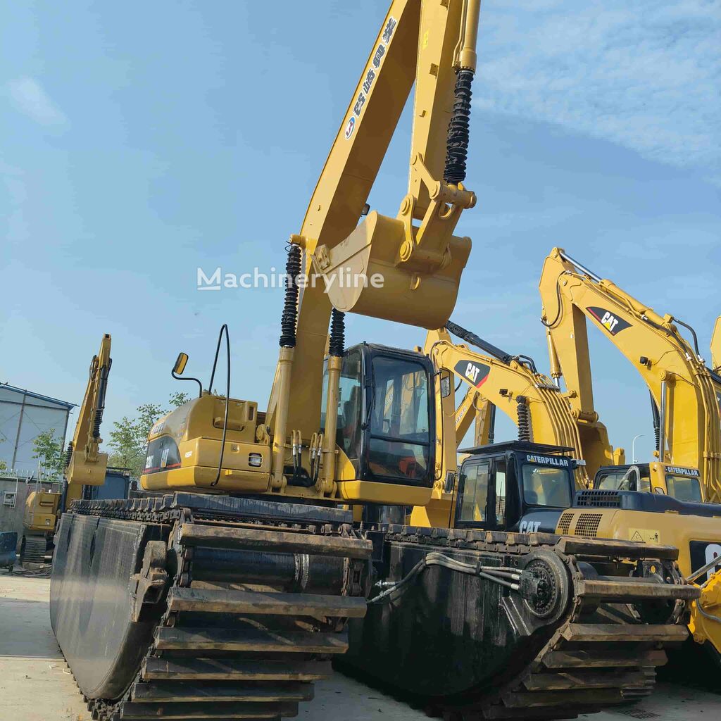 Caterpillar 320CL bager amfibija