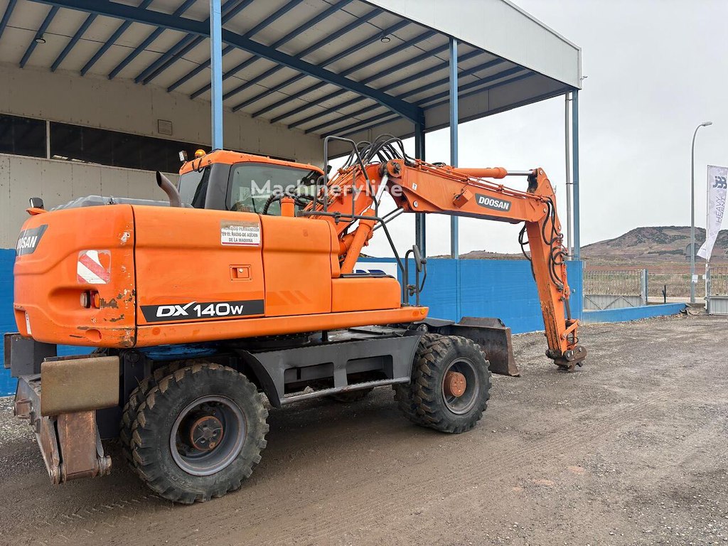 Doosan DX140W bager točkaš