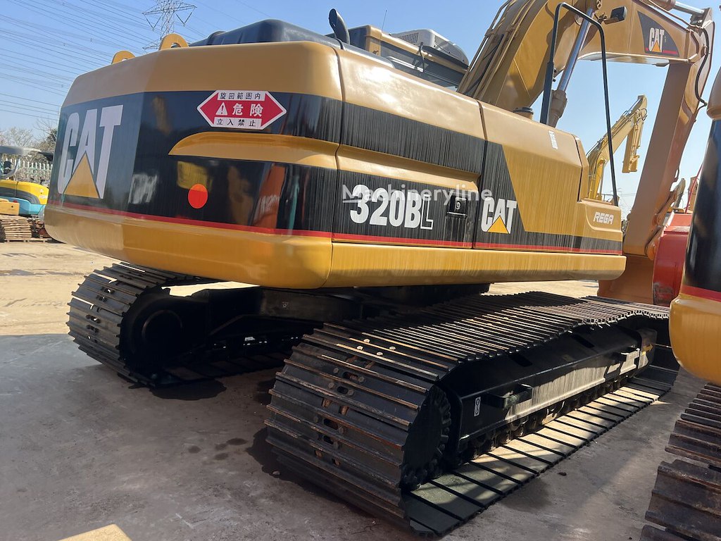 Caterpillar 320BL bager guseničar