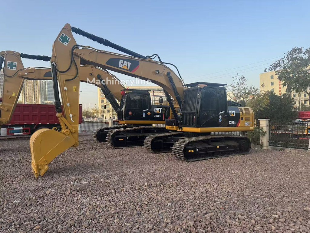 Caterpillar 320DL bager guseničar