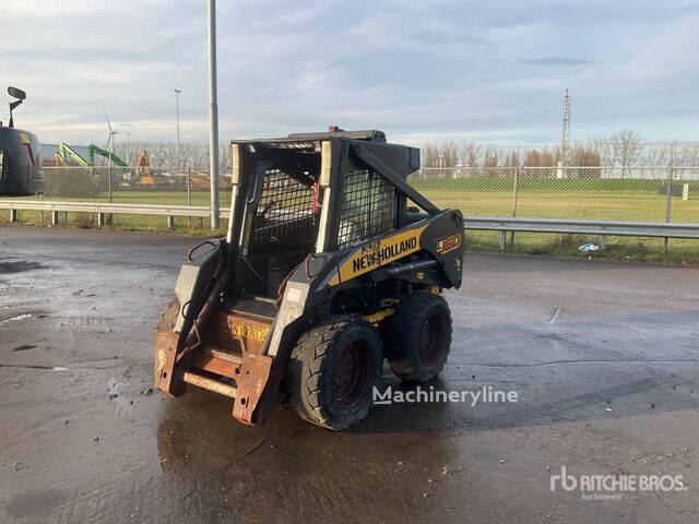 Prodaje se New Holland L160 mini utovarivač na aukciji