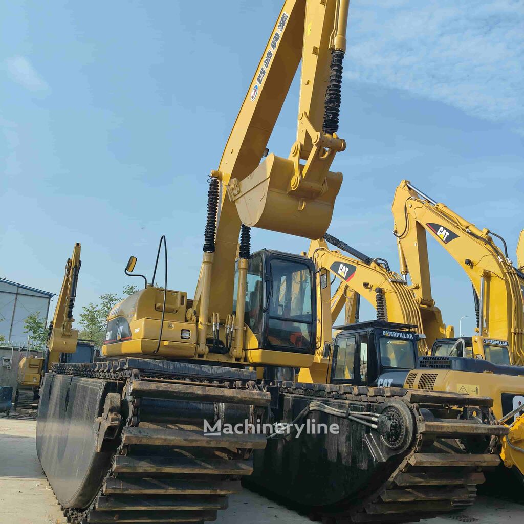 Caterpillar 320CL bager amfibija
