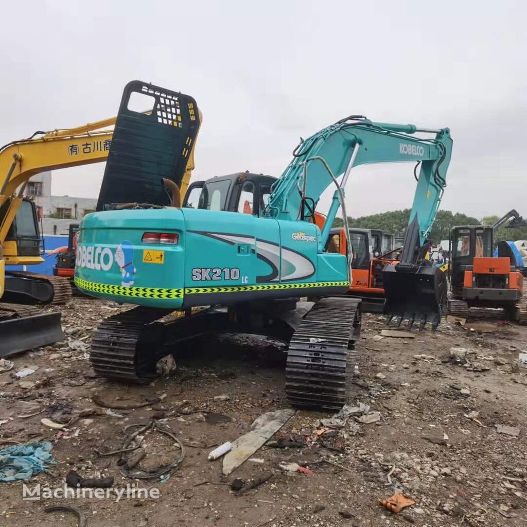 Kobelco SK210 bager guseničar