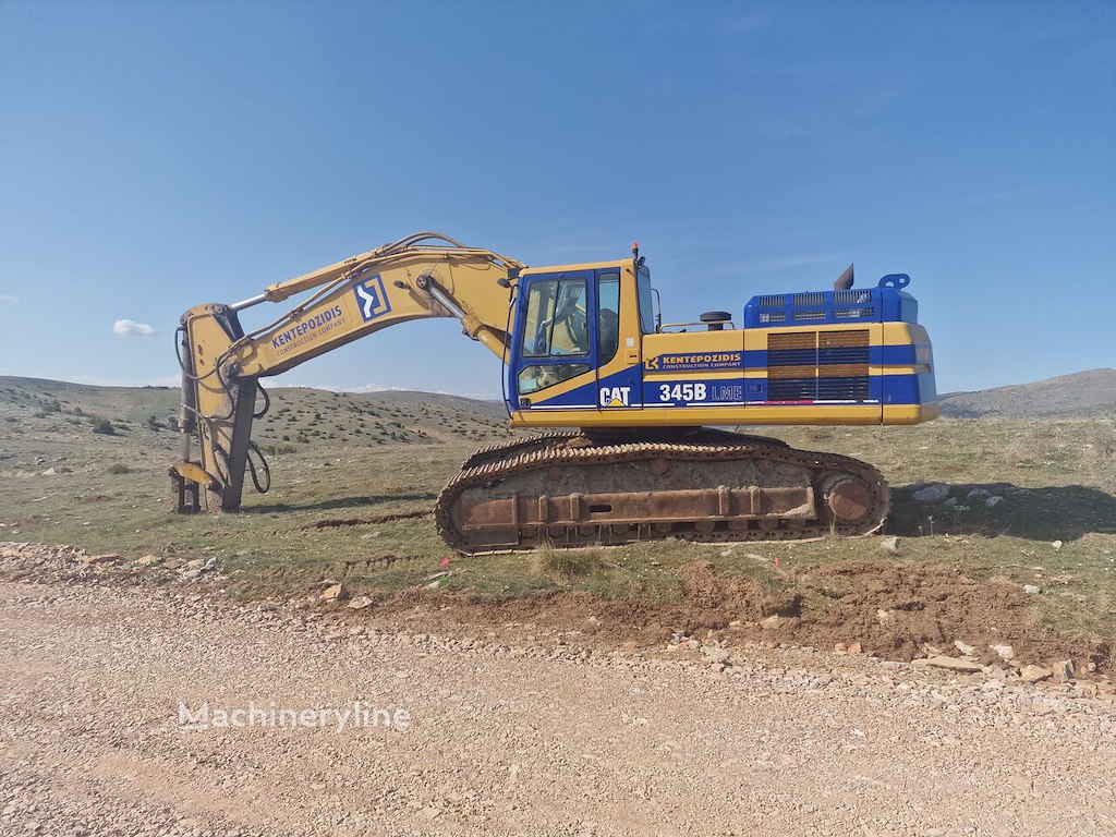 Caterpillar 345BL bager guseničar