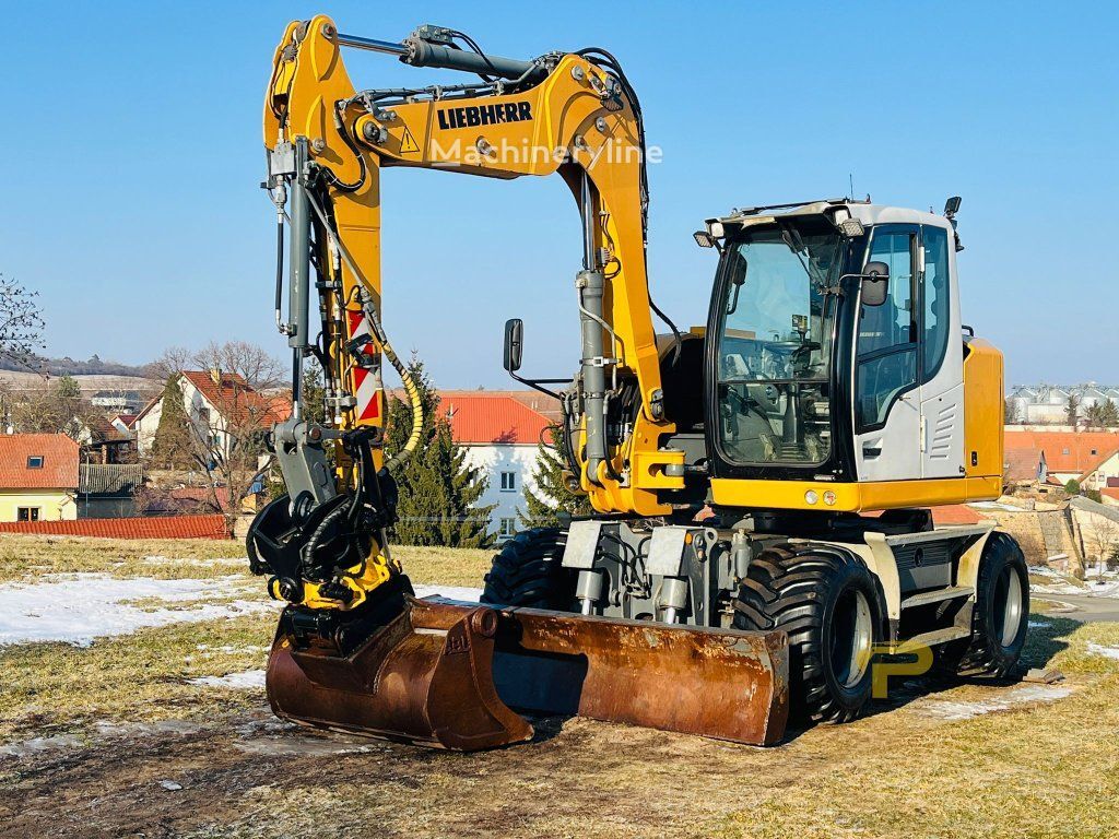 Liebherr A910 bager točkaš