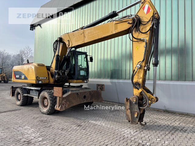 Caterpillar M322D bager točkaš