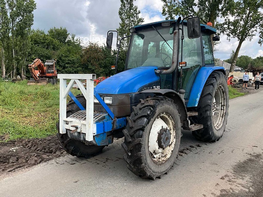 Prodaje se New Holland TL90 traktor točkaš na aukciji