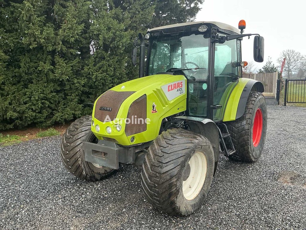 Prodaje se Claas AXOS 310 Type A22 traktor točkaš na aukciji