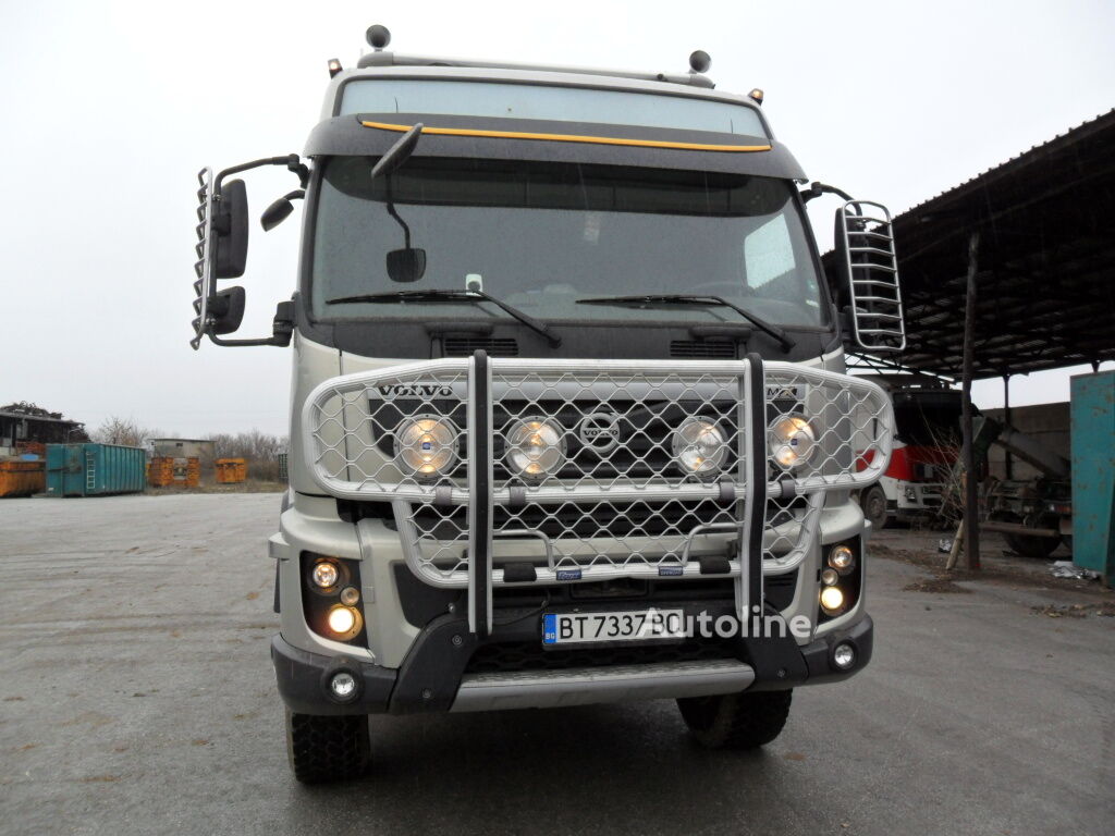 Volvo FMX kamion za prevoz drva + šumarska prikolica