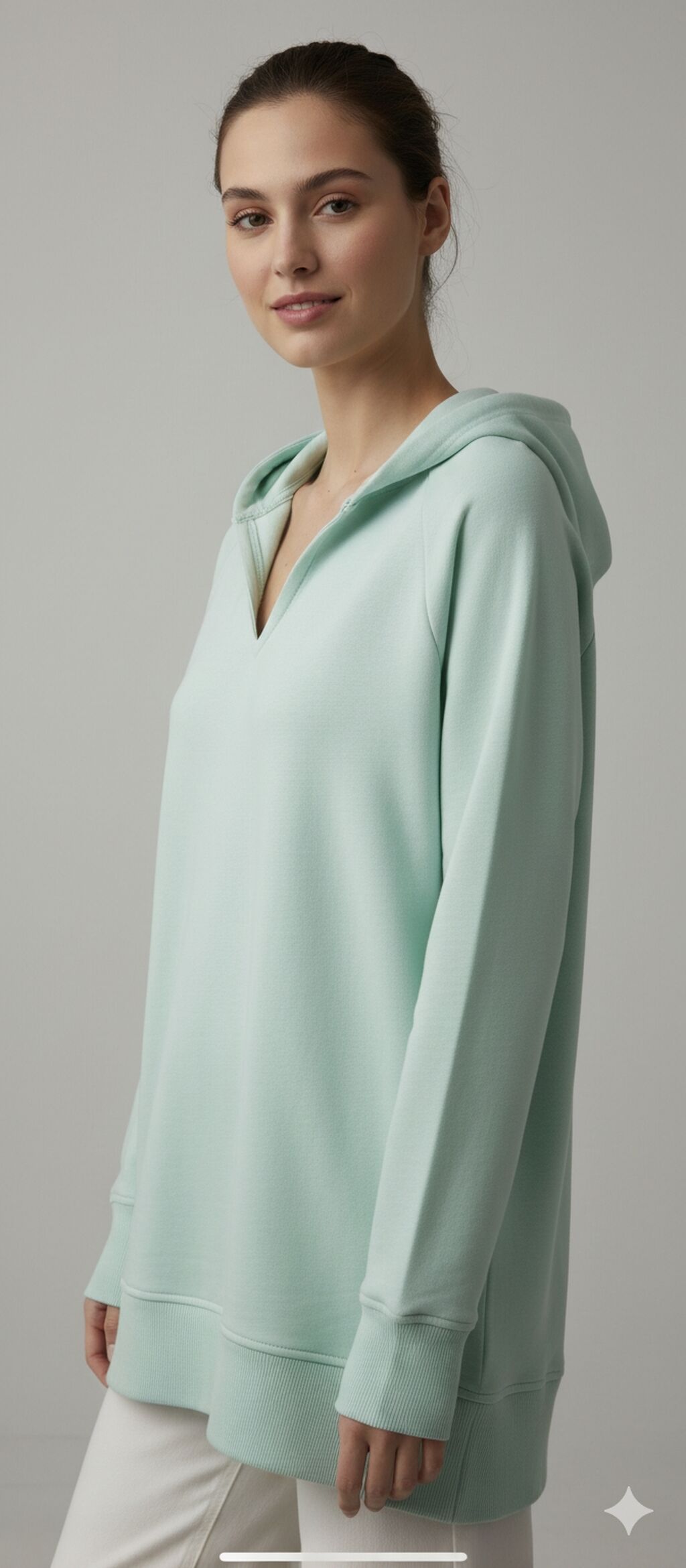Ženska dukserica sa kapuljačom – pastelno mint zelena - Model: duži