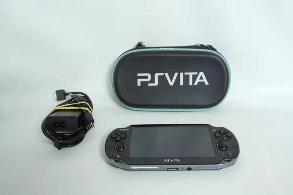 REZERVISANO. Sony PlayStation Vita (serija 1000, OLED), u odličnom