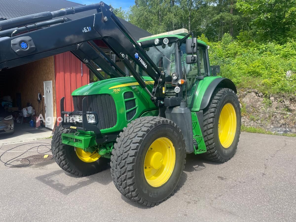 Prodaje se John Deere 7530 E-Premium 50 km med Trima frontlaster traktor točkaš na aukciji