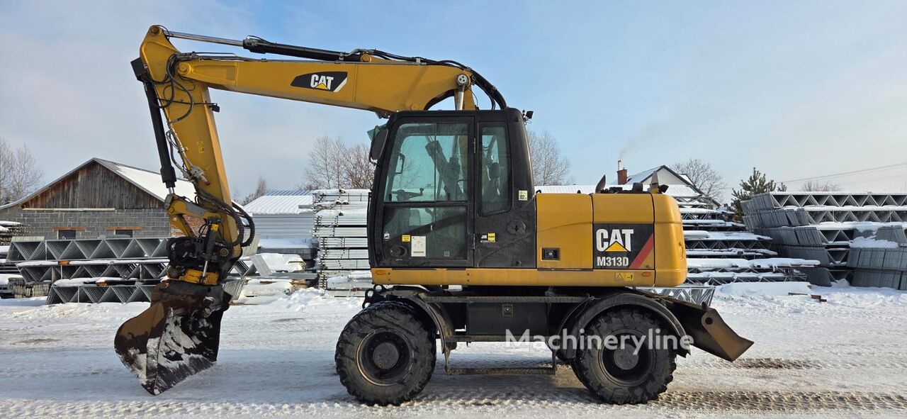 Caterpillar M313D bager točkaš
