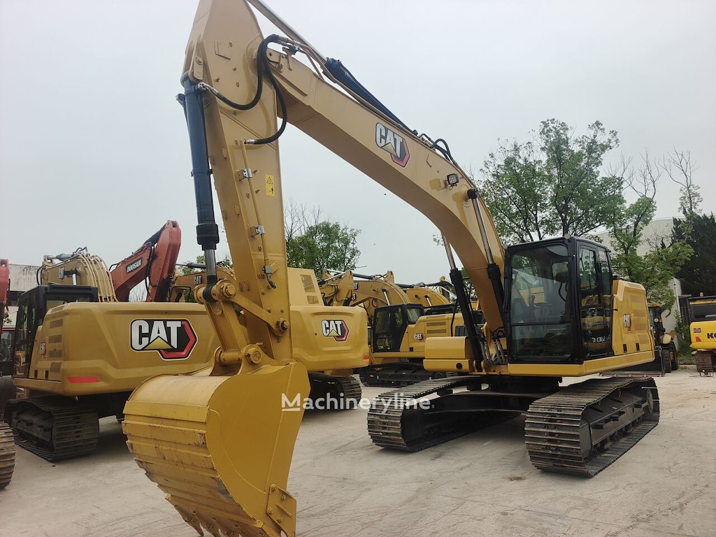 Caterpillar 323 bager guseničar