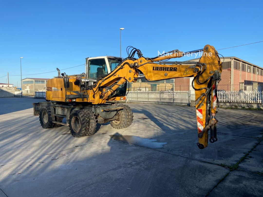 Liebherr A309 bager točkaš