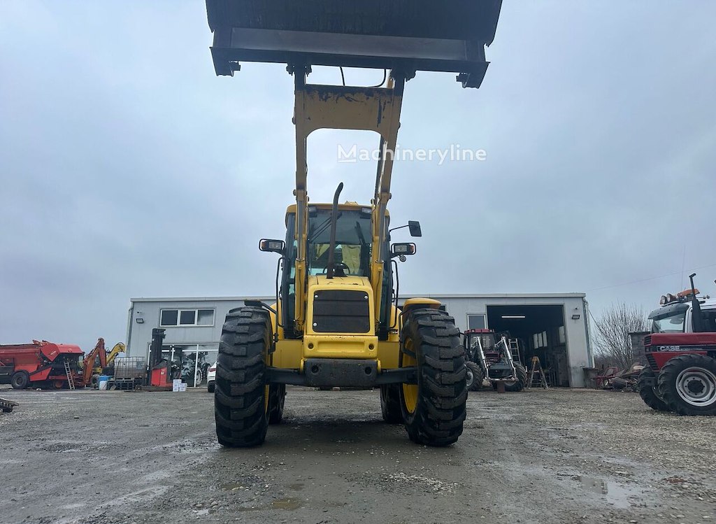New Holland LB115 bager-utovarivač