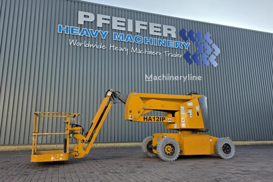 Haulotte HA12IP As-Is, Electric, 12m Working Height, 6.7m R hidraulična zglobna platforma