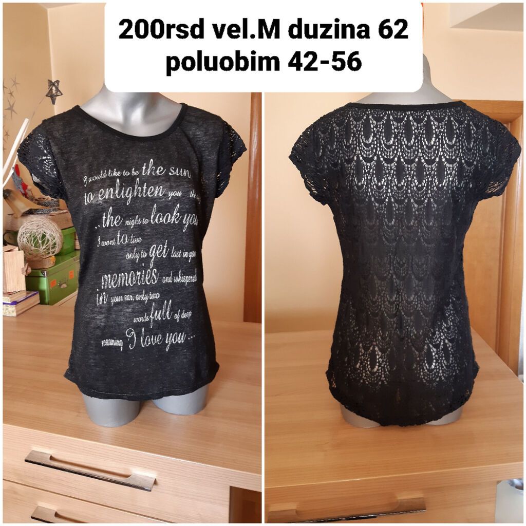 Crna ženska majica kratkih rukava, vel. M. Dužina 62 cm, poluobim