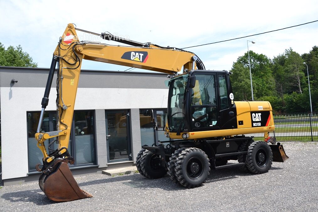 Caterpillar M 315 D bager točkaš