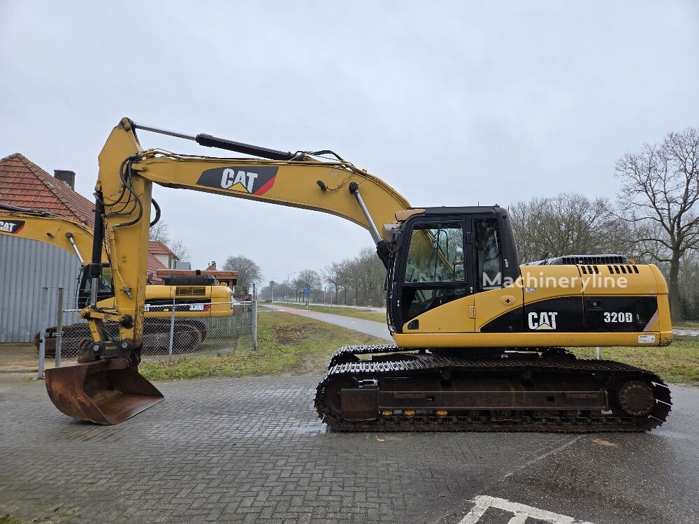 Caterpillar 320DL bager guseničar