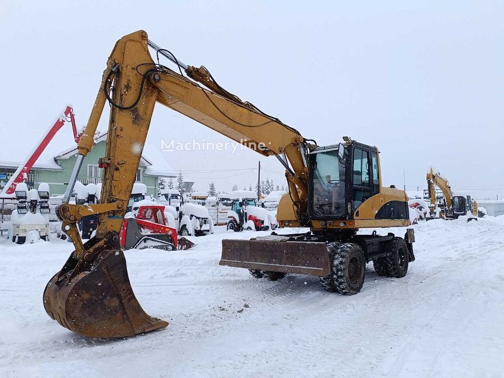 Prodaje se Volvo EW210 bager točkaš na aukciji